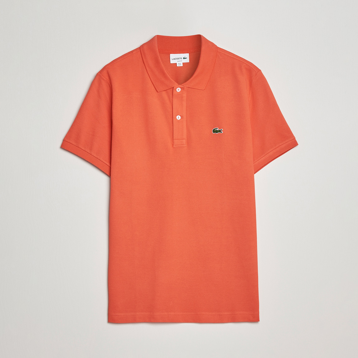 Lacoste Slim Fit Polo Piké Watermelon su CareOfCarl.it